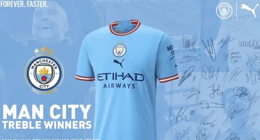 Manchester City Official Treble Winners Commemorative Shirt - CharityStars