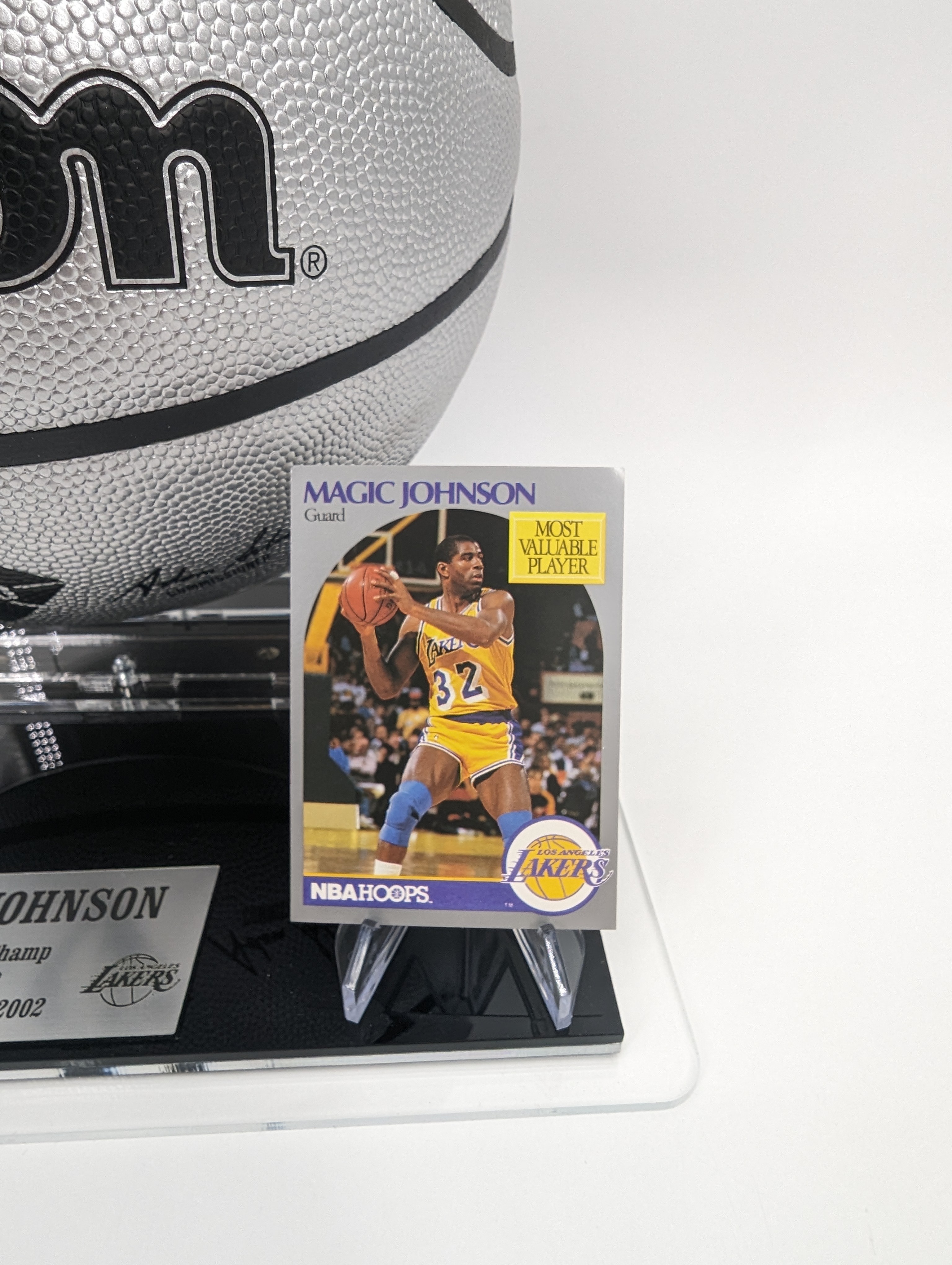 Magic Johnson Signed Basketball in Display Case - CharityStars