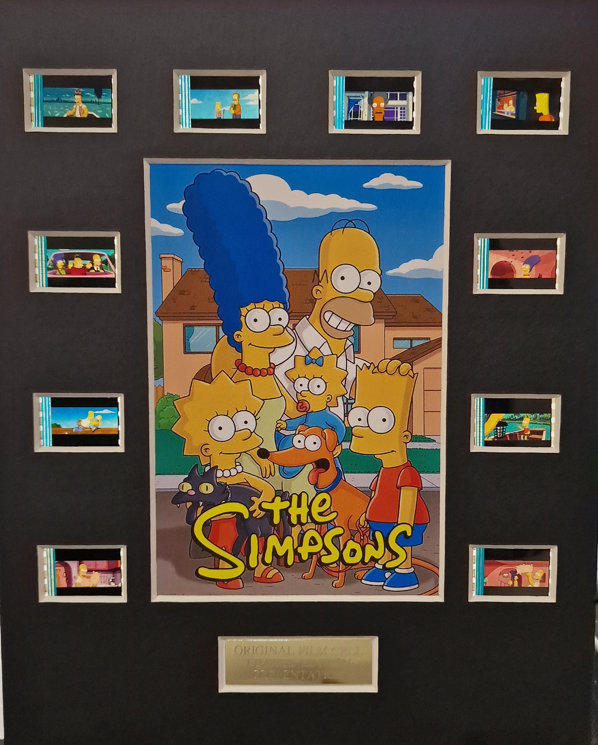 Maxi Card with original fragments from The Simpsons film - CharityStars
