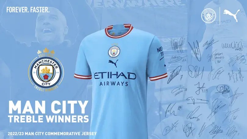 Manchester City Official Treble Winners Commemorative Shirt - CharityStars