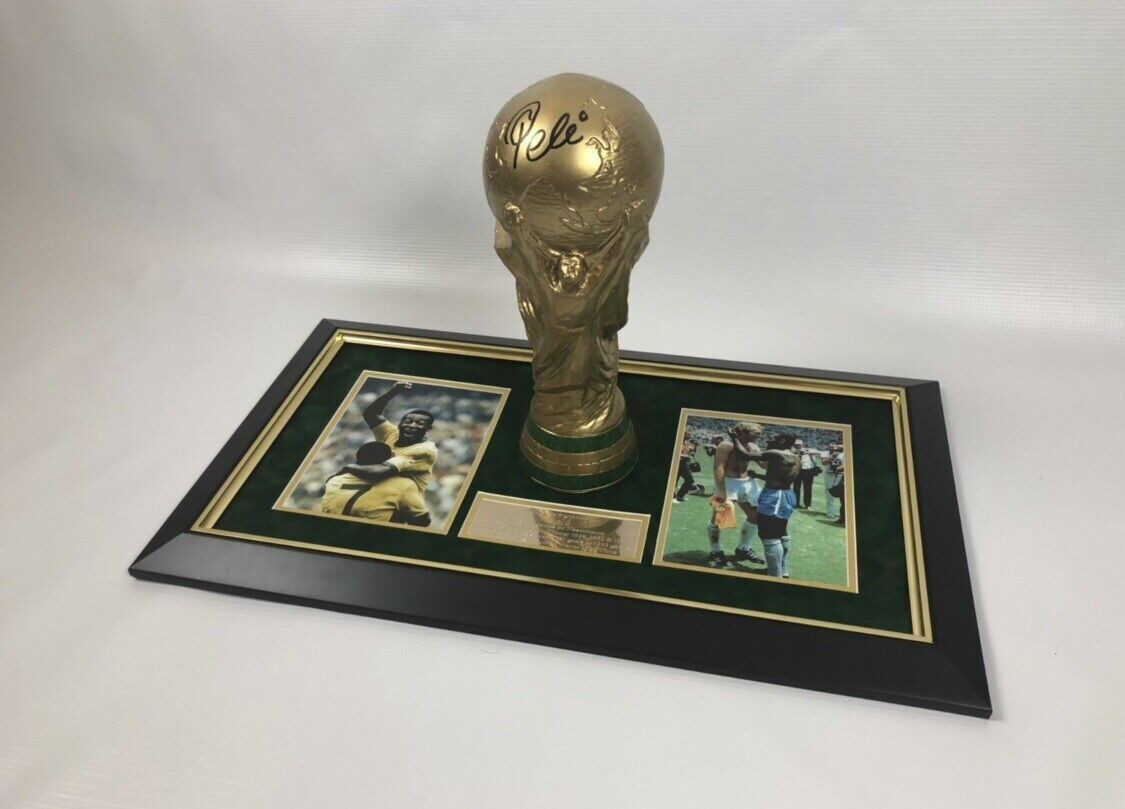 Pelè Signed World Cup Trophy - CharityStars