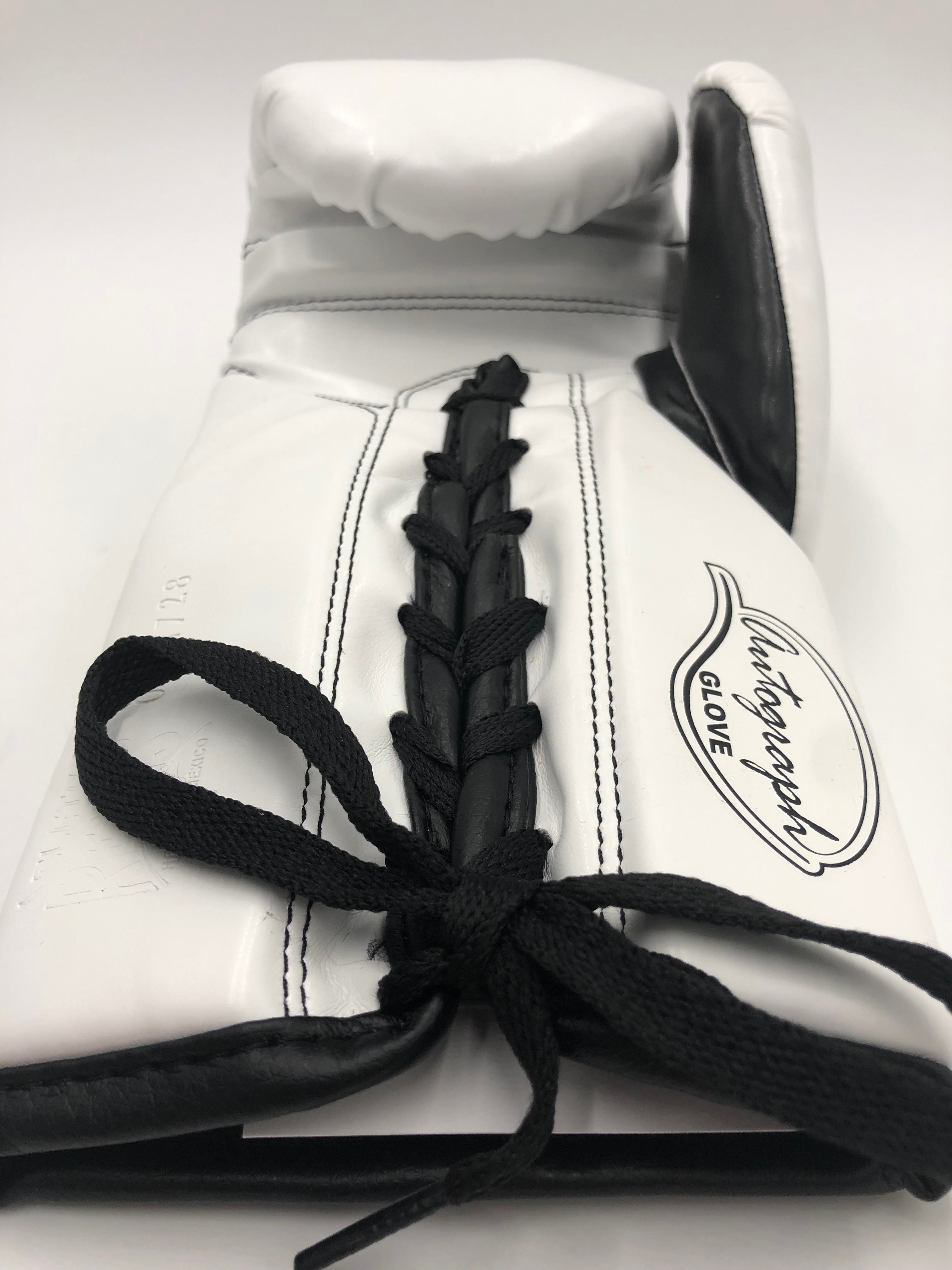 Mike Tyson Signed Boxing Glove In Display Case - CharityStars
