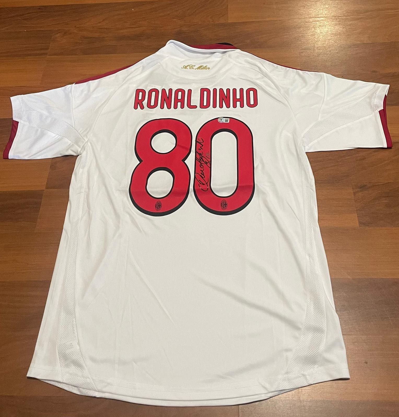 Ronaldinho's AC Milan 2009/10 Signed Replica Shirt - CharityStars