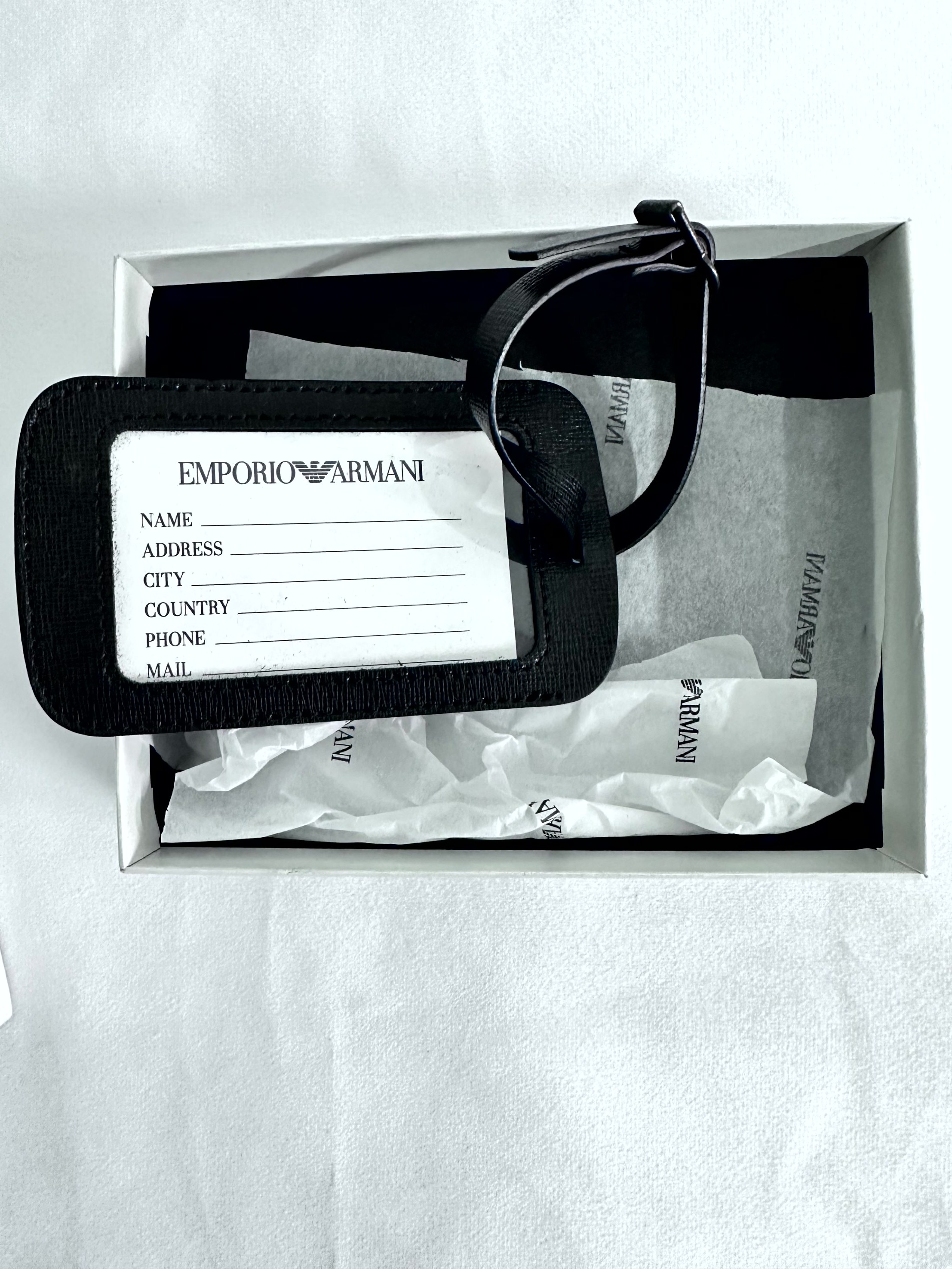 Italy's Emporio Armani Travel Label - CharityStars