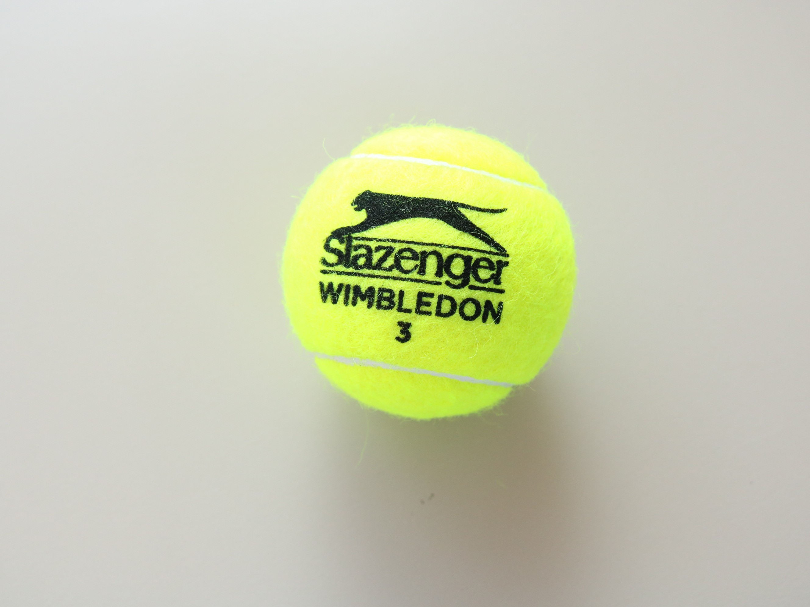 R - Wimbledon Tennis Ball signed by Jannik Sinner - CharityStars