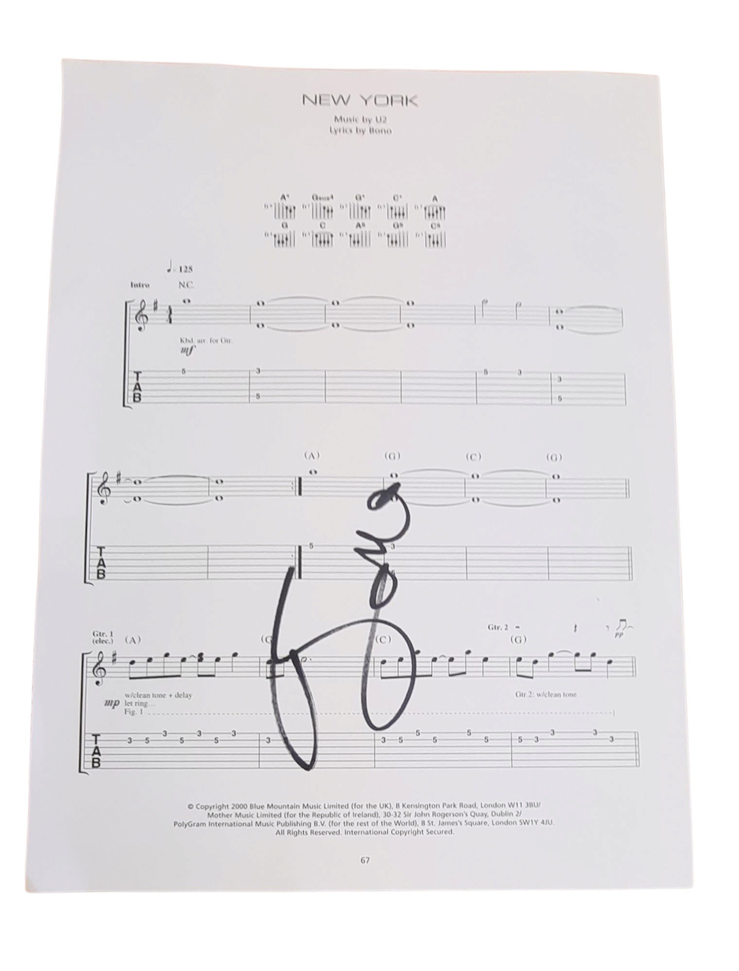 Bono of U2 Signed Sheet Music - CharityStars